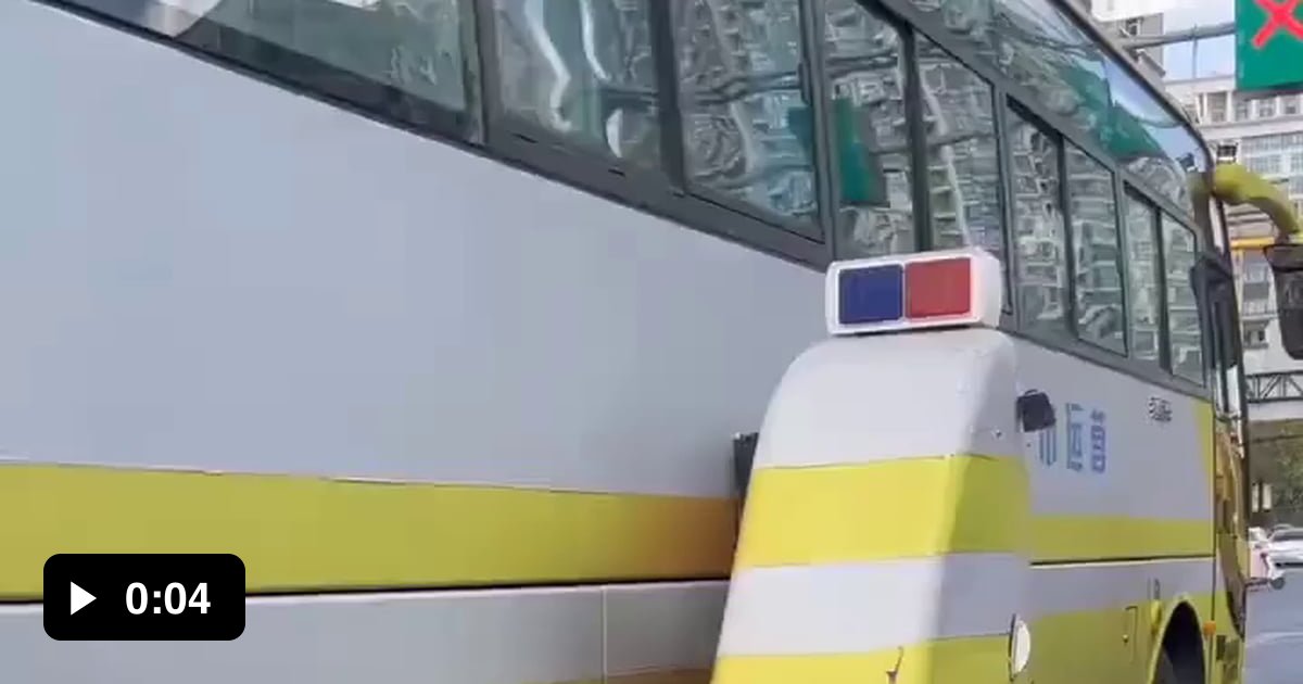 Bus laying down road barriers - 9GAG