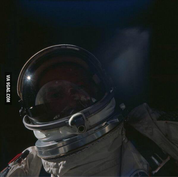 Buzz Aldrin's self portrait during Gemini 12 with Earth reflecting in his visor - 9GAG