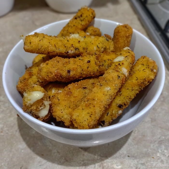 Cheddar sticks fried in golden breadcrumbs and oregano. - 9GAG