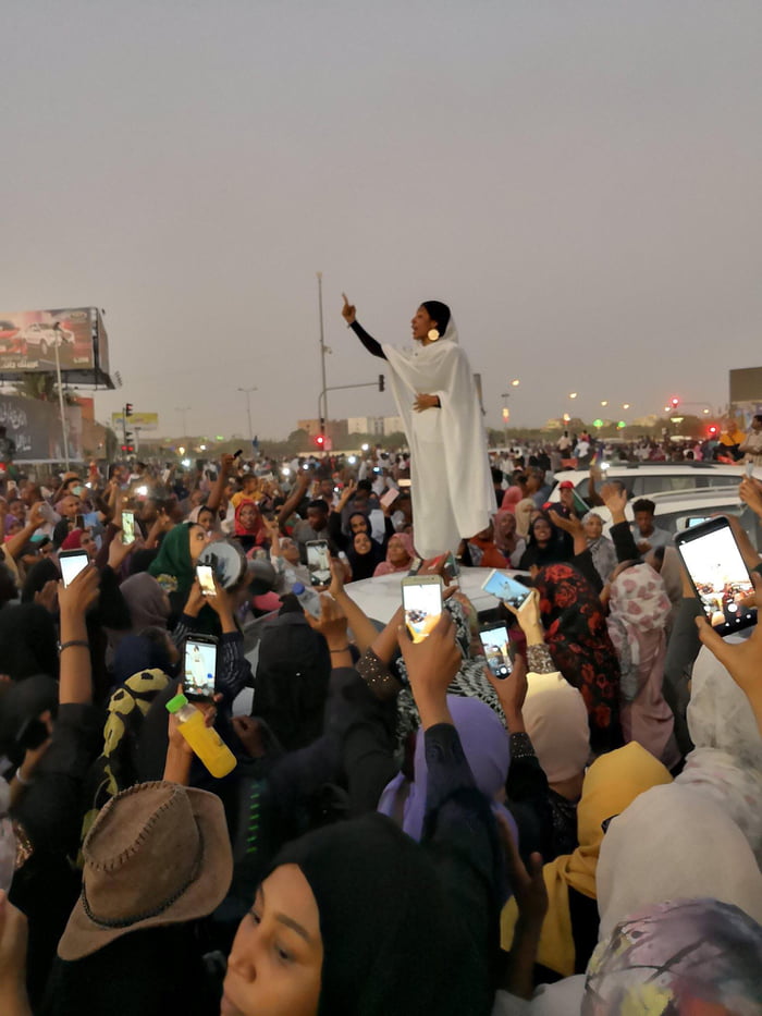 This photograph of a young Sudanese woman dressed in a traditional “tob ...