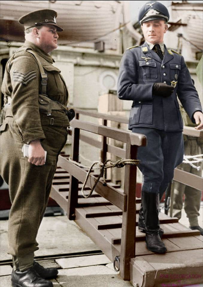 German officer, expecting to be returned to Berlin, looks at his ...