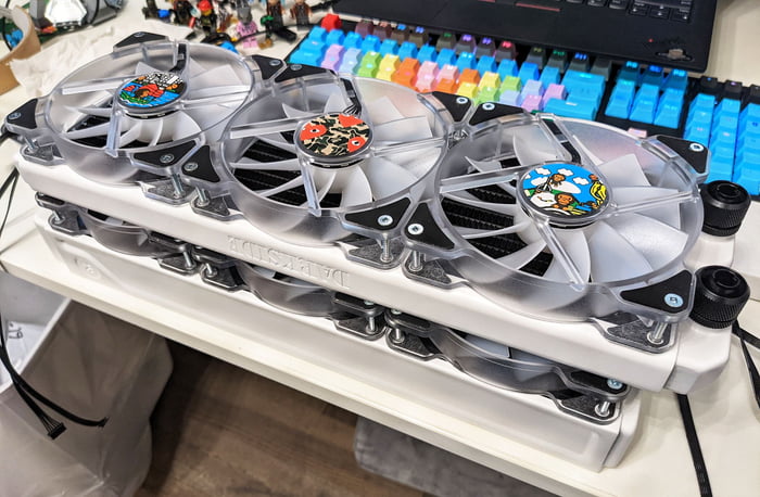 Radiators painted white and custom stickers for the fan hubs applied ...