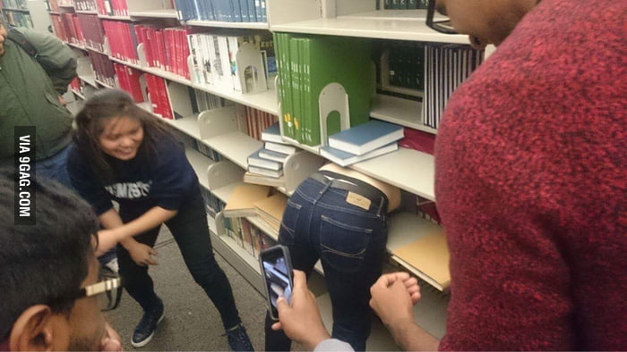 So this guy got stuck in our library's automated bookshelves - 9GAG