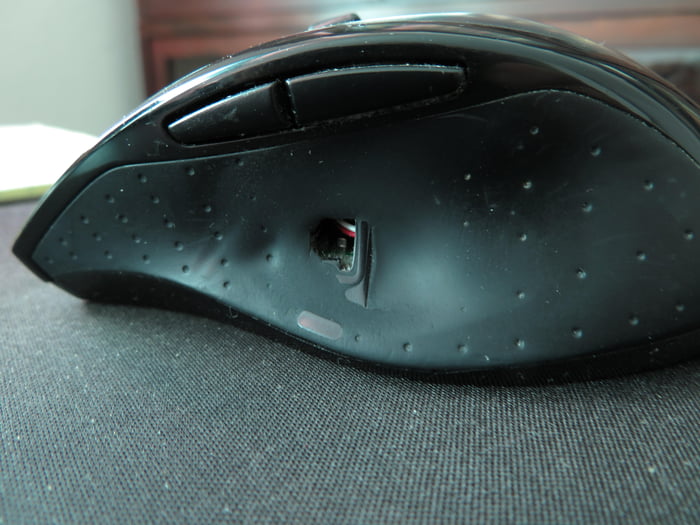 My thumb has worn a hole in my Logitech M705 mouse - 9GAG