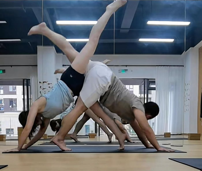 Classic yoga pose done by your wife and her instructor. - 9GAG