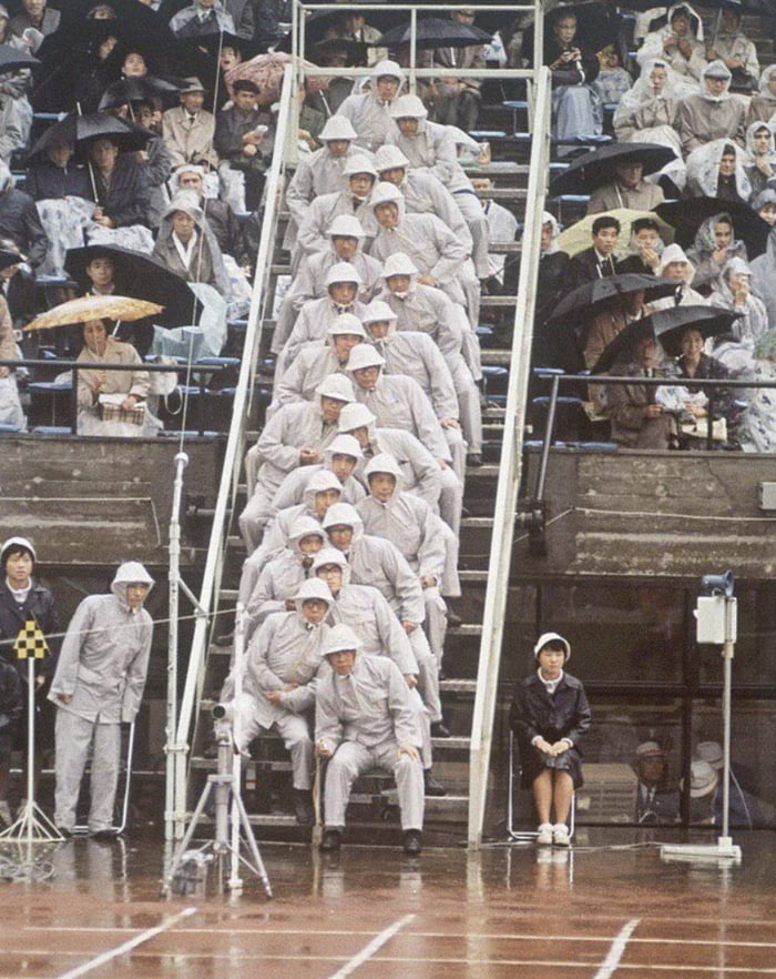 The 1964 Olympic Games: People in white were observers at the running ...
