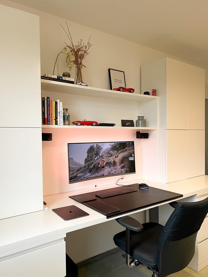 Cozy, modern desk setup with loads of storage space powered by a hidden ...