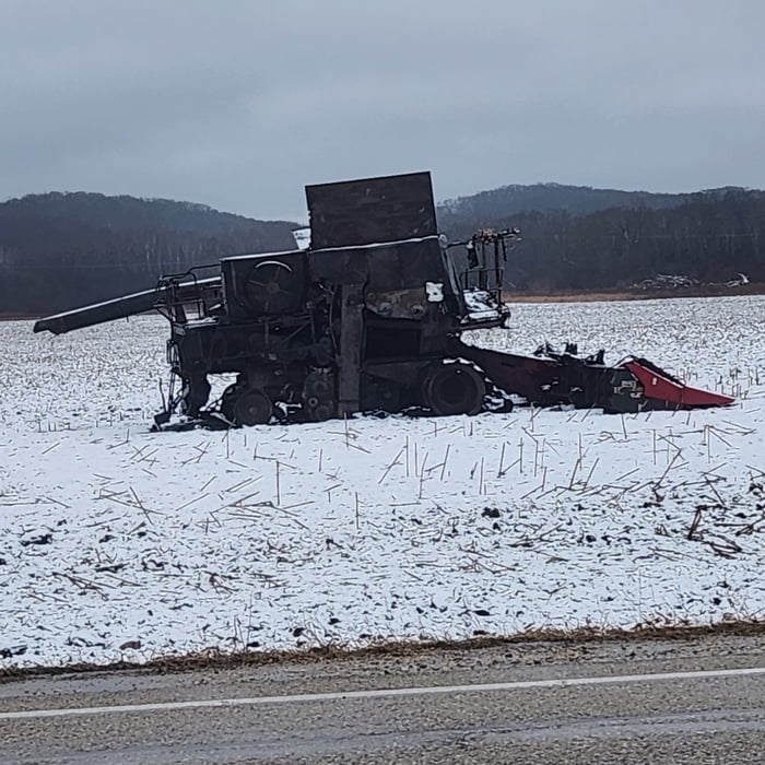 Some farmer lost his John Deere combine in a fire. There's a few ...