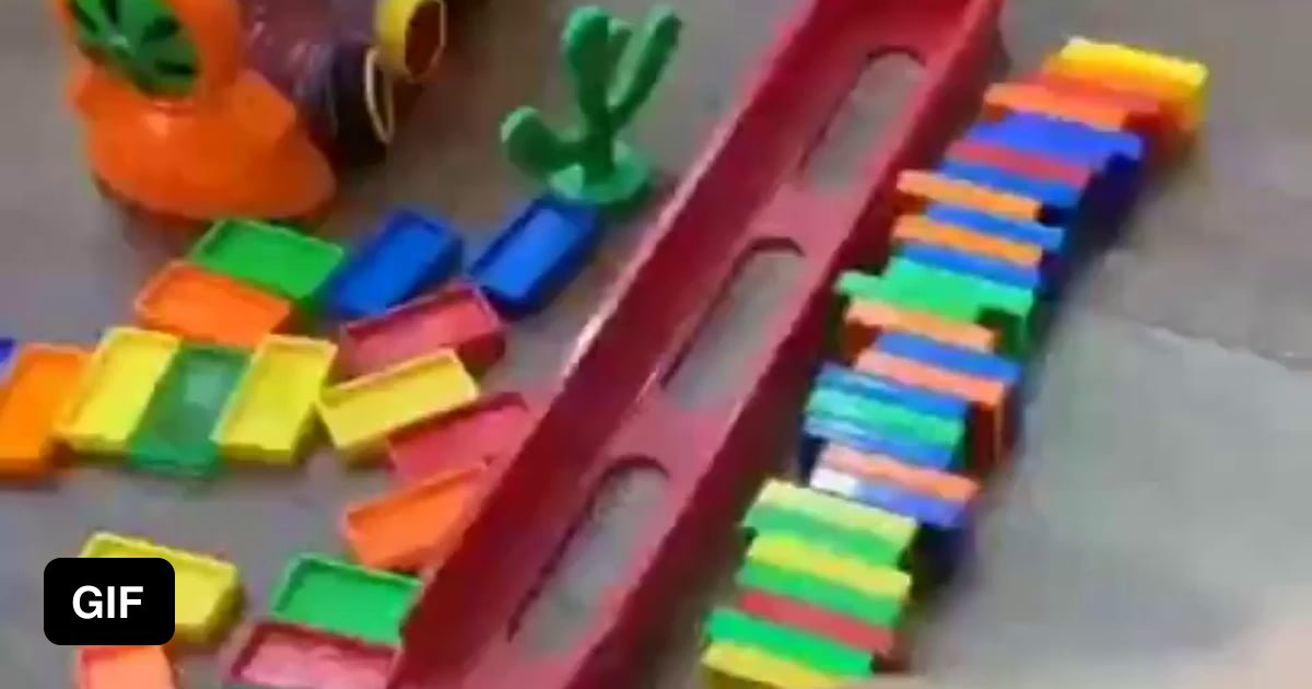 This train makes the dominoes automatically - 9GAG
