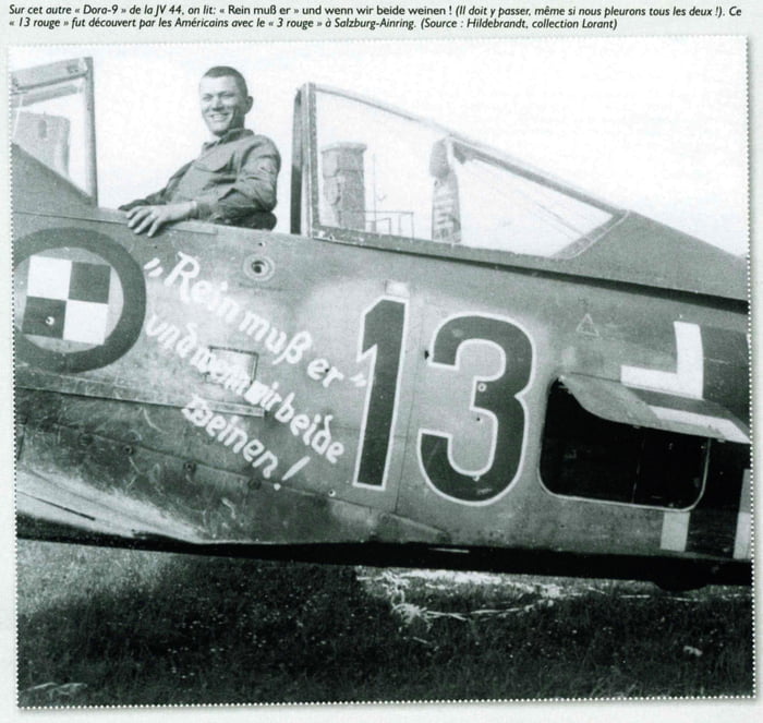 A GI sits in the cockpit of a Fw 190D9 from JV44-Red 13. Salzburg. May ...