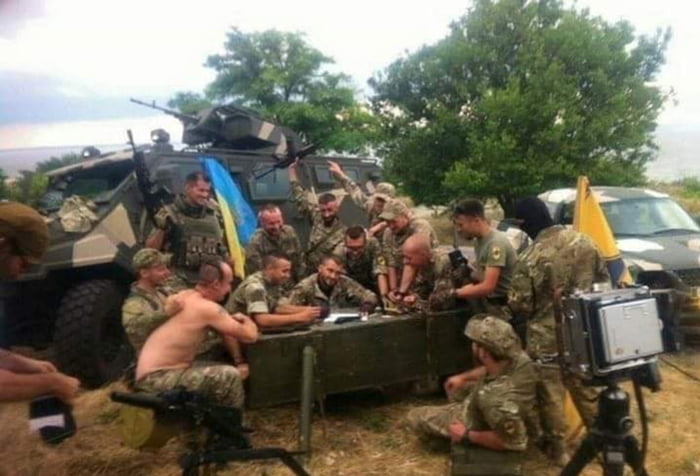 Ukrainian soldiers recreate famous painting ,"Cossacks write a letter ...