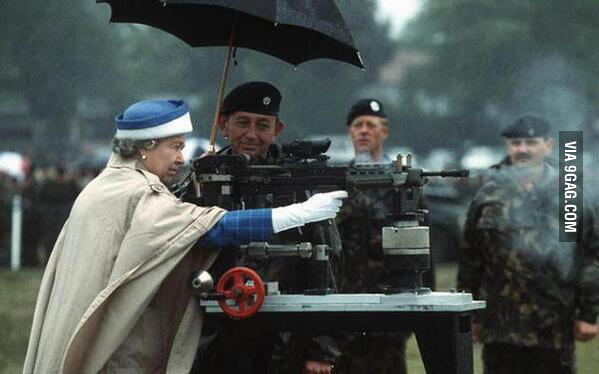 Queen Elizabeth II firing a machine gun, 1993 - 9GAG