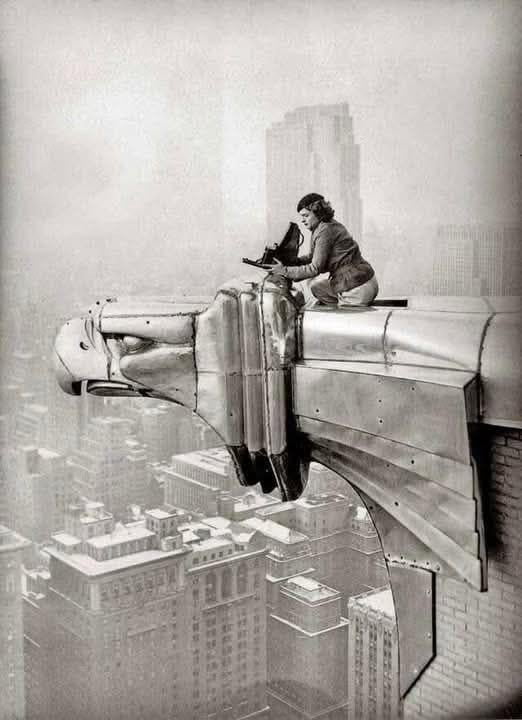 Photographer Margaret Bourke White taking a photo from the top of the ...