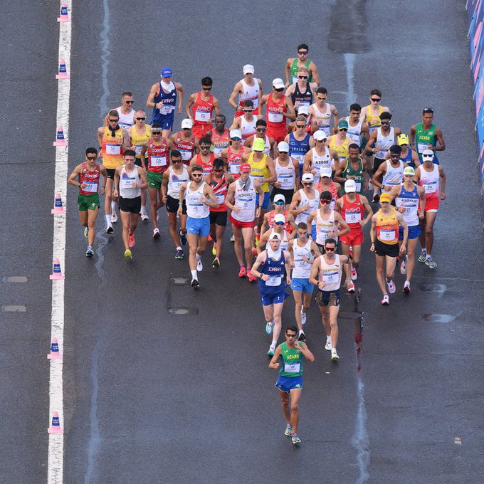 Olympic racewalking athletes forming a map of Brazil, led by a ...