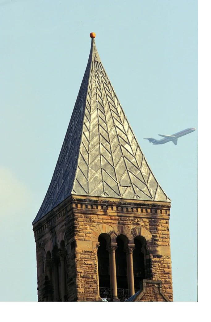 23 years ago, someone impaled a 60 pound pumpkin on the top of a spire ...