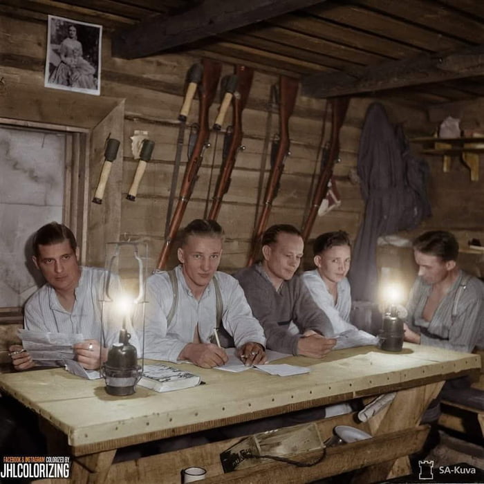 Finnish soldiers participate in off-duty activities in a dugout ...