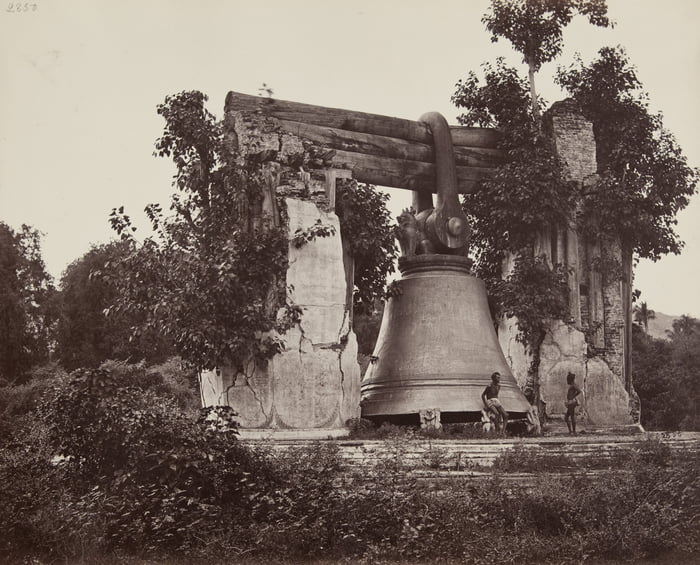 Locals Stand Next To The Massive Burmese Mingun Bell The Largest
