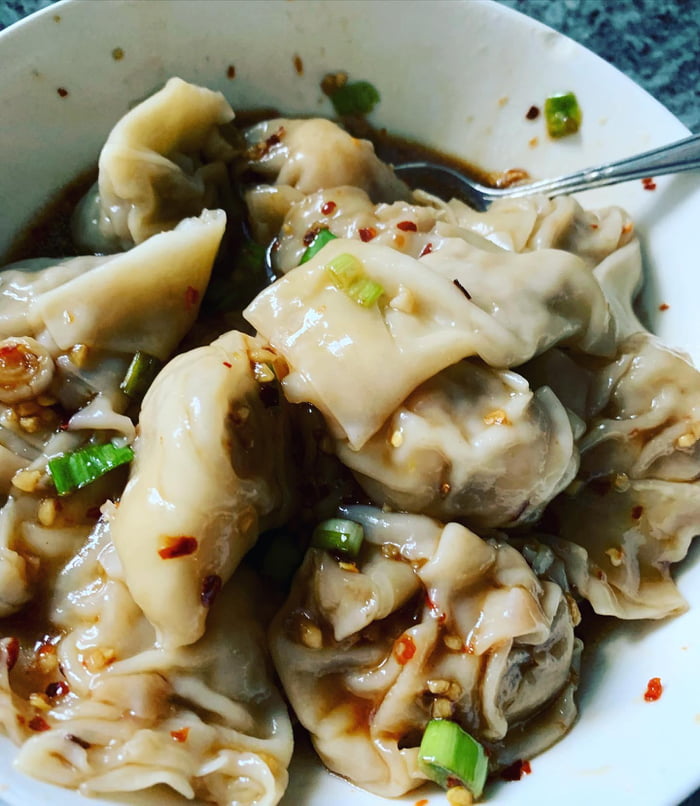 Pork and shrimp coin purse dumpling with a spicy soy-black vinegar ...