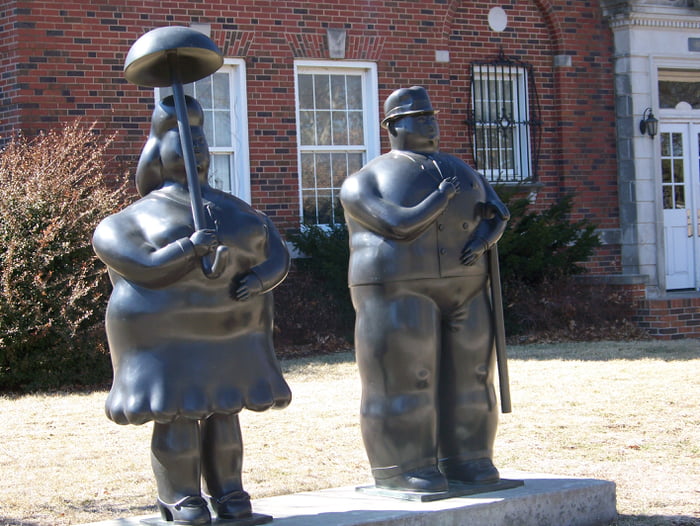 Statues of Wichita State University. "Woman With Umbrella" and "Man ...