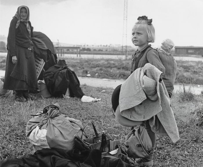 An ethnic German girl in a transit camp before being deported from ...