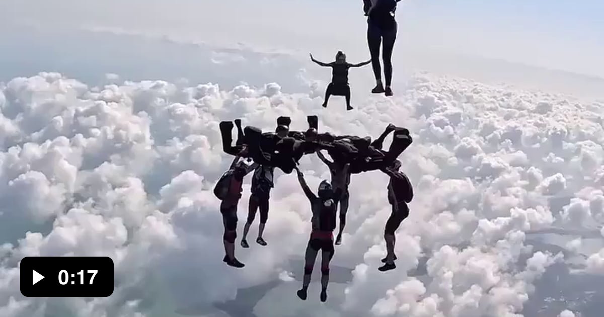 Incredible human formation high above the clouds and ocean - 9GAG