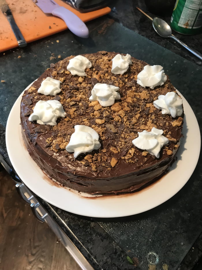 Chocolate and Crunchie Bar Cake topped with Whipped Cream Flourettes - 9GAG