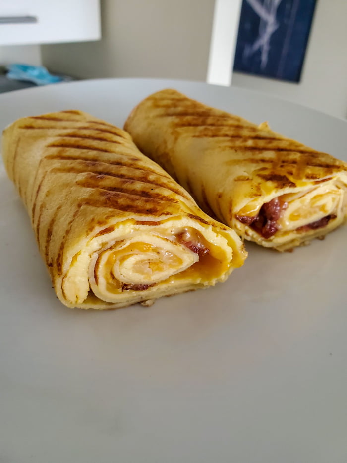A grilled crepe filled with a bacon and cheese omelette - 9GAG