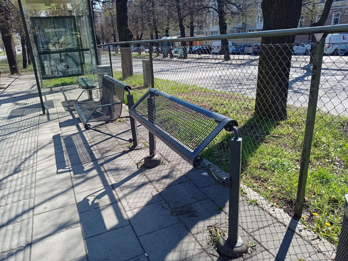 Do they have these lean-on-standing chairs at the bus stop in your ...