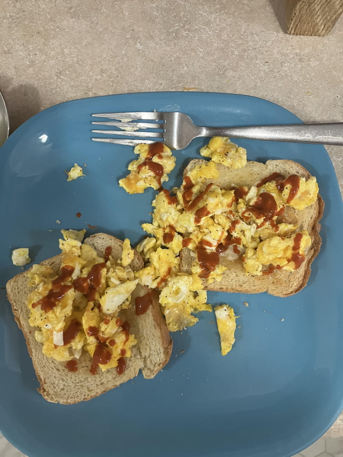 Scrambled eggs on toast with some hot sauce. - 9GAG