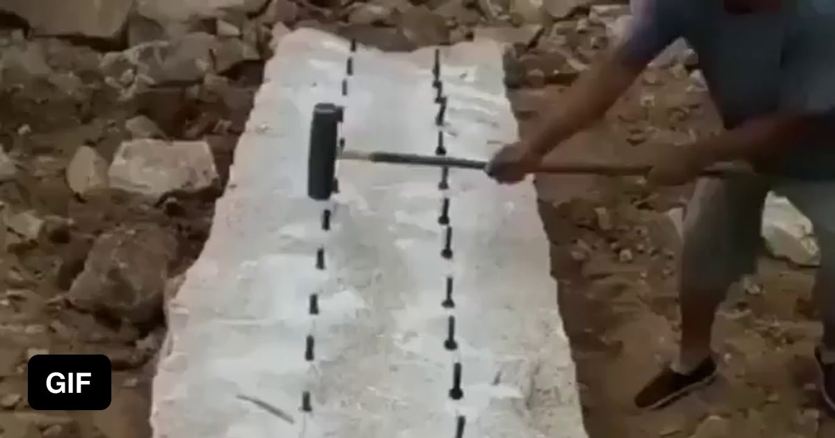 Splitting stone the old fashion way - 9GAG