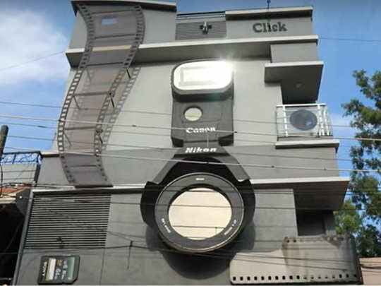 Photographer builds three-storey classic camera shaped house in ...