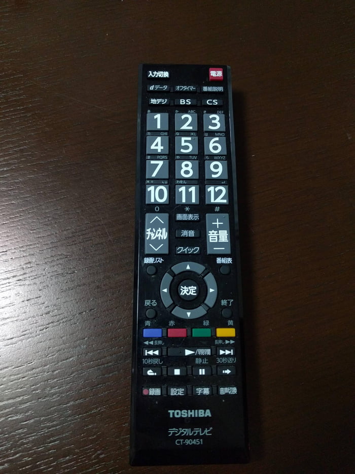 This TV remote in Japan has a 10, 11, and 12 button. - 9GAG