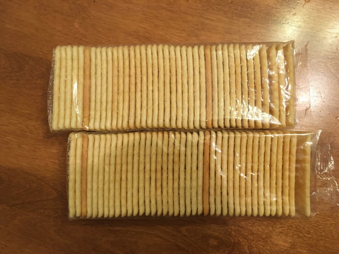 There are 21 crackers between the darker colored crackers in each ...