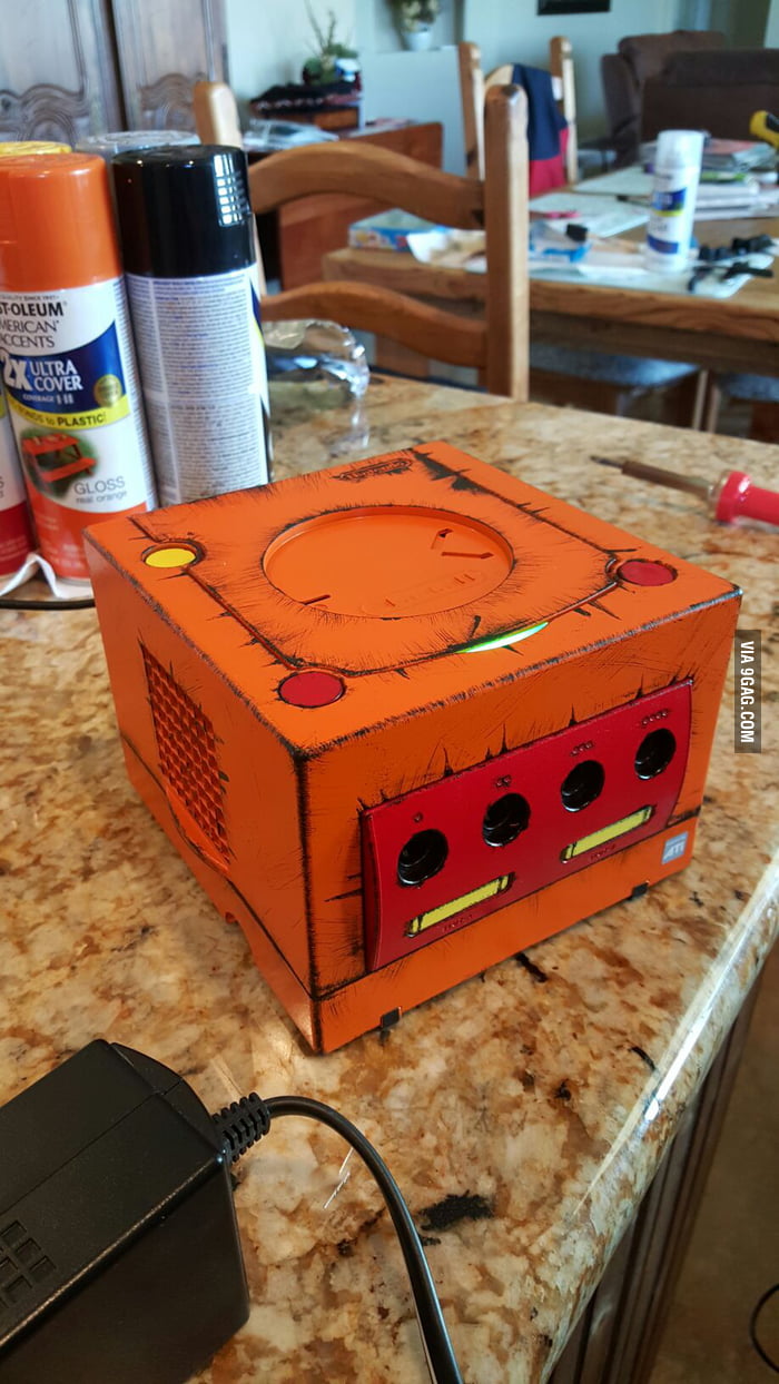 My latest custom gamecube. Will update when I finish painting the top ...
