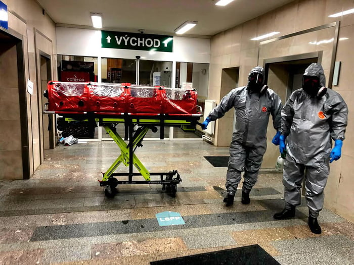 This photo from the transport of a suspected ebola infected patient. - 9GAG