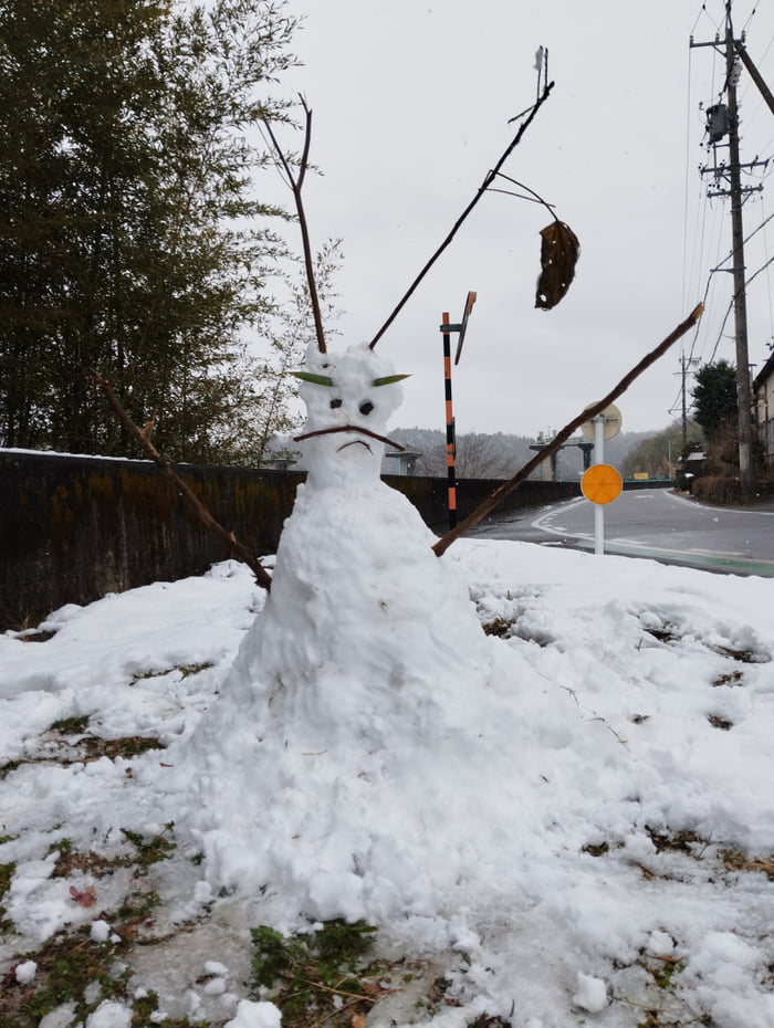 Made my first snowman ever. I tried to make him as miserable as I am ...