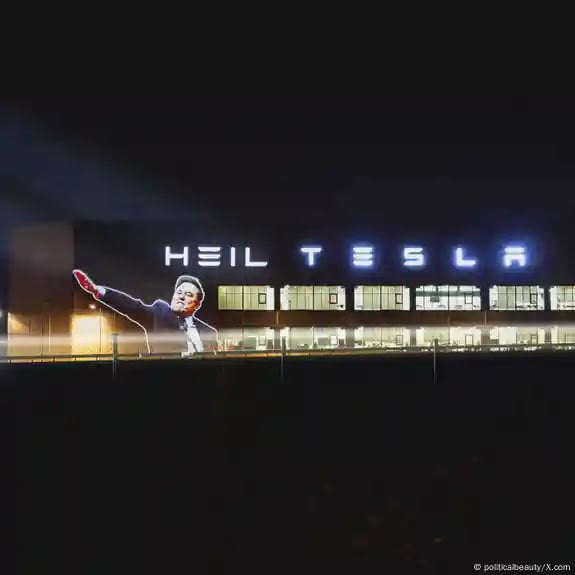 Projected onto a factory in Germany ...a group named Led by donkeys ...