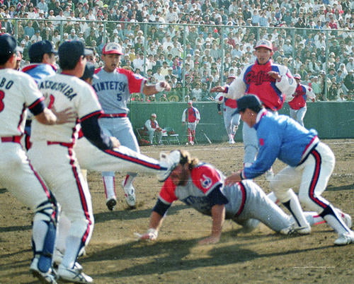 Masaichi Kaneda (obscured) kicks Jim Traber in the face during a brawl ...