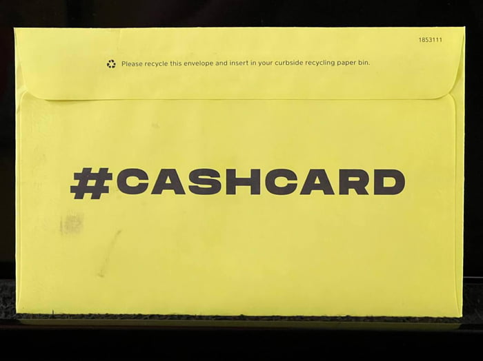 Cash App sends you their debit card in a bright neon yellow envelope ...
