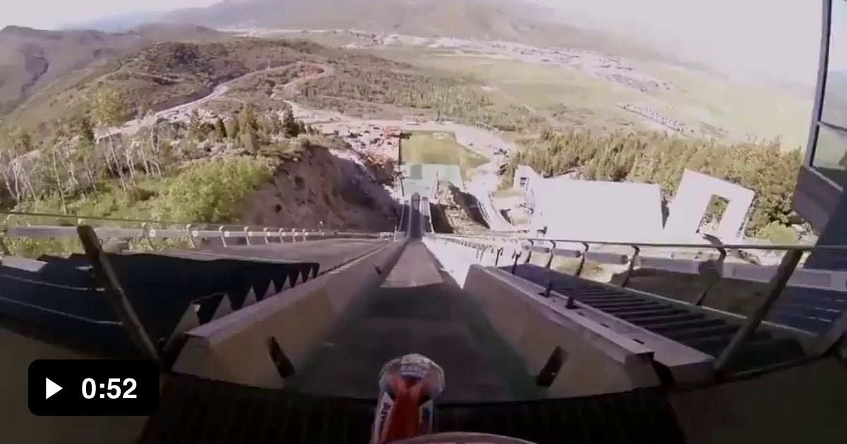 Robbie Maddison rides motorcycle off ski jump, Maddison,launched going ...