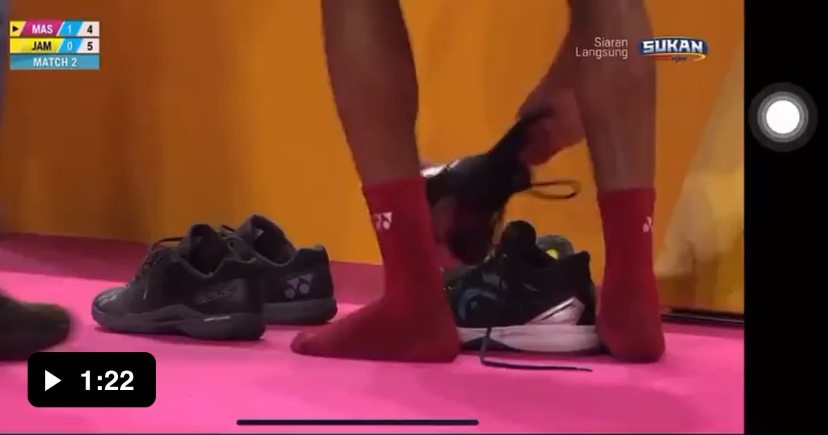 Malaysian Badminton coach Hendrawan giving his own shoes to Jamaican ...