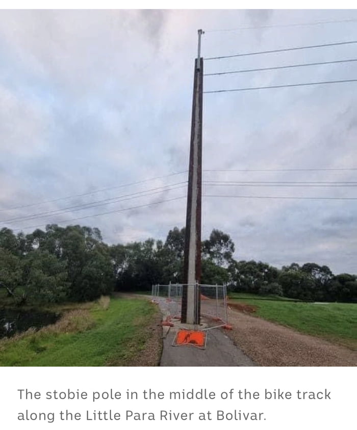 You had one job.....Installed power pole in middle of cycle path. Well ...