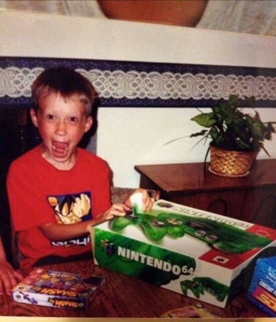 A boy's reaction after opening a nintendo 64 on his birthday.[1999] - 9GAG