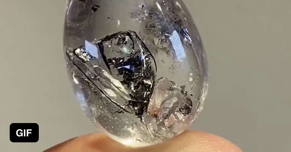 Ancient Water And Carbon Trapped Inside A Polished Quartz Crystal - 9GAG