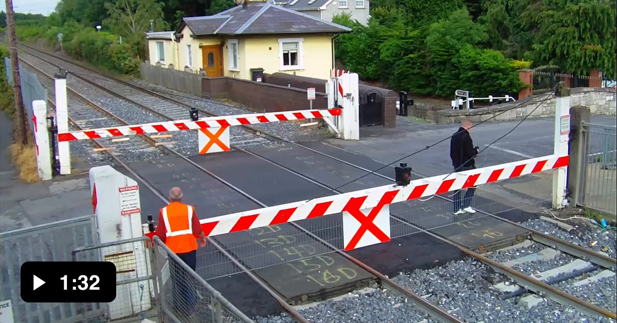 The old-style manned railway crossing at Ashtown station in Dublin ...