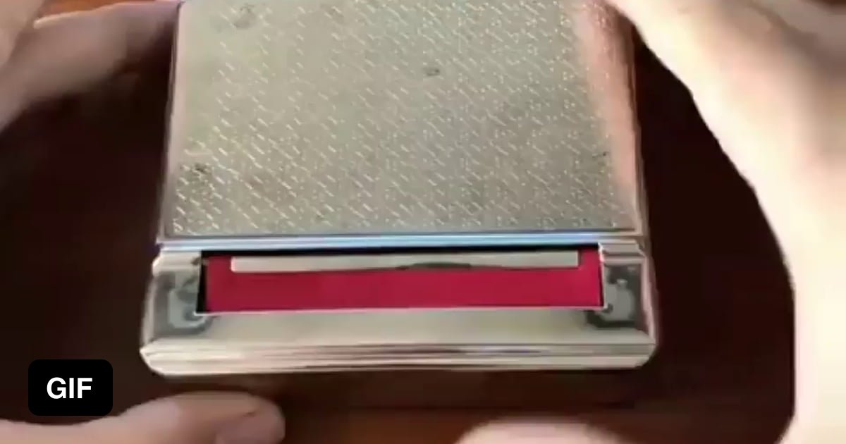 A cigarette rolling case.. - 9GAG