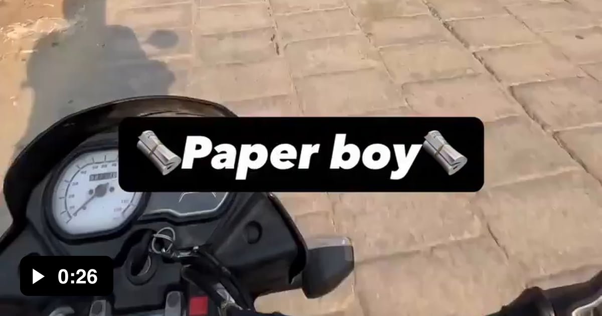 Paper boy passing newspapers in Indian village with 17 years of ...