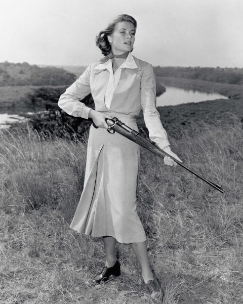 Grace Kelly toting a rifle at the filming location of Mogambo, 1953 - 9GAG