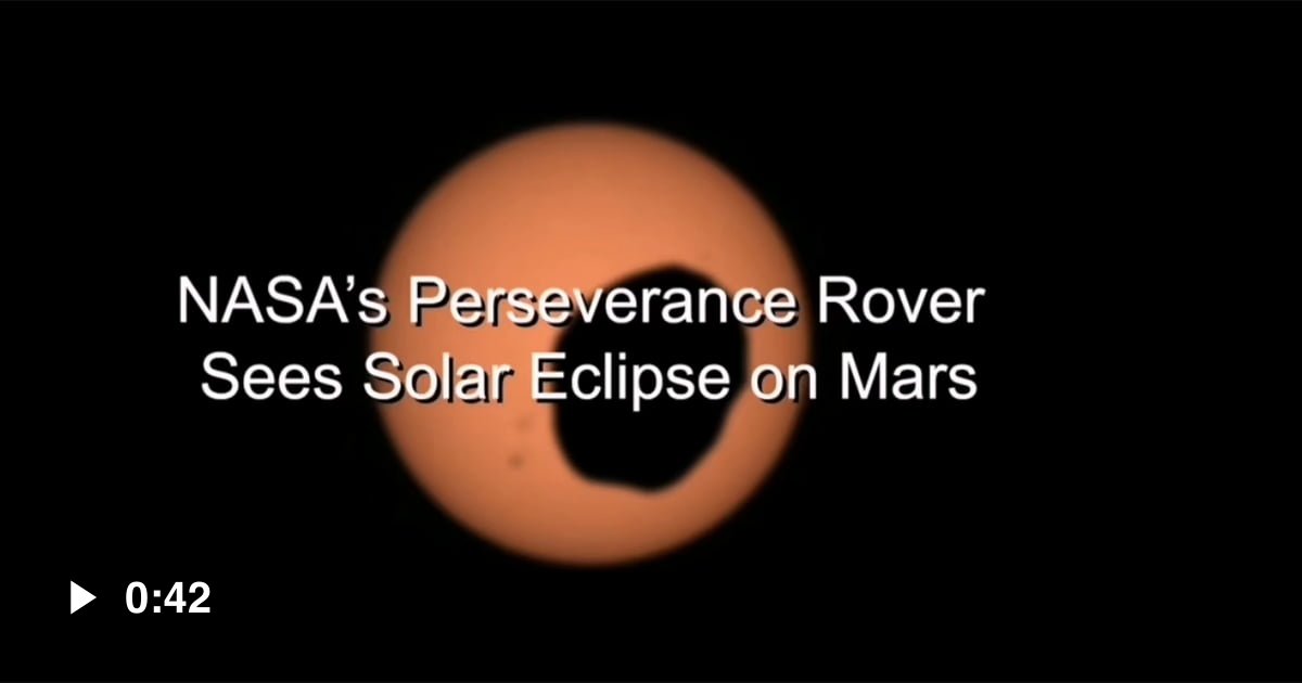 Solar eclipse on Mars (potato shaped thing is Phobos, Mars larger moon ...