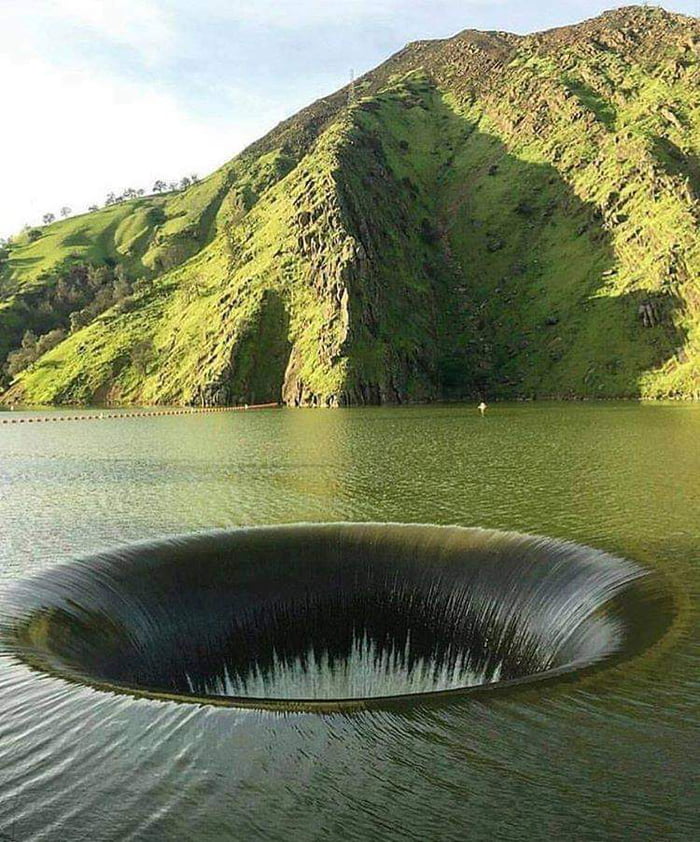 The ‘Glory Hole’ Spillway in Monticello dam’s reservoir, Northern California. - 9GAG
